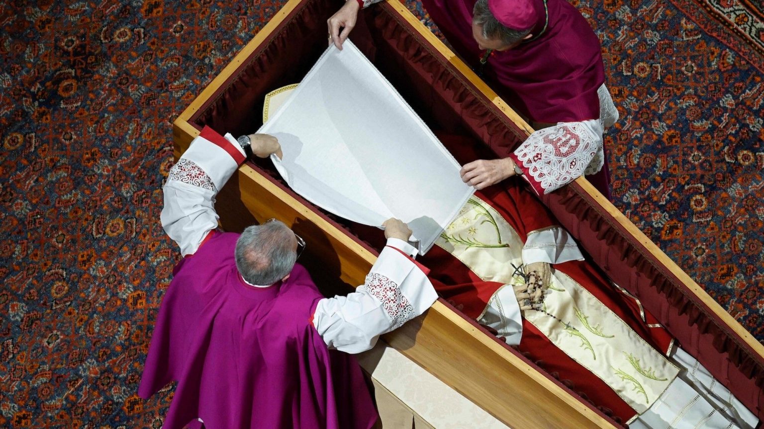 How does a pope's funeral take place?